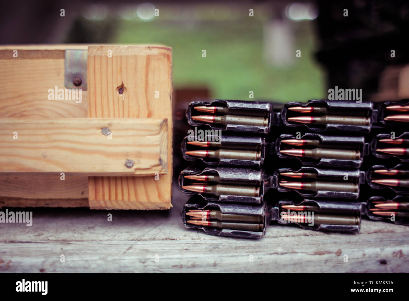 Automatic rifle cartridge with bullets on a military shooting range ...