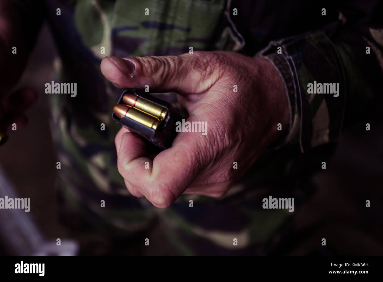 Soldier loading 9mm caliber hi-res stock photography and images - Alamy