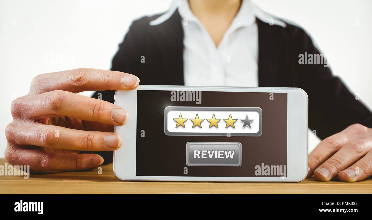 Digital composite of Woman holding phone with review button and star ...