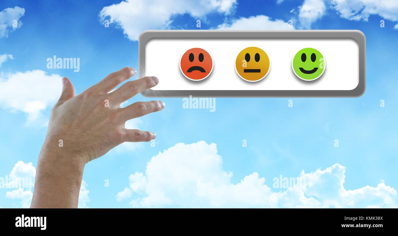 Digital composite of Hand touching smiley faces feedback buttons Stock ...