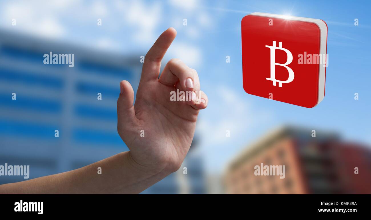 Digital composite of Hand touching bitcoin symbol icon Stock Photo - Alamy