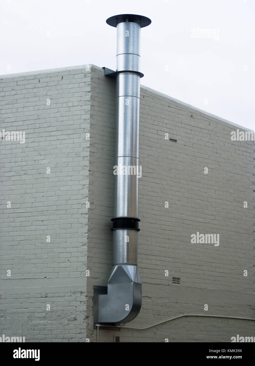 Extraction chimney on building exterior Stock Photo - Alamy