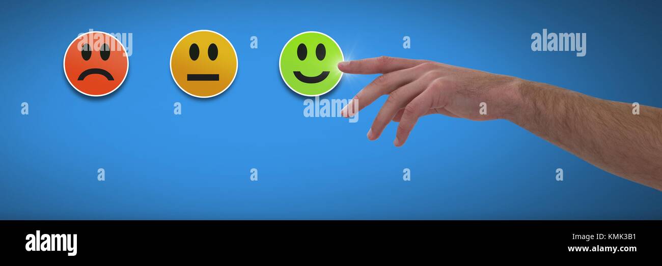Digital composite of Hand pointing at feedback smiley faces ...