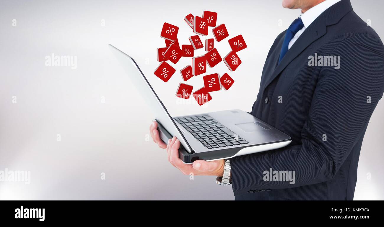 Digital composite of Hand holding laptop with percent symbol icons ...