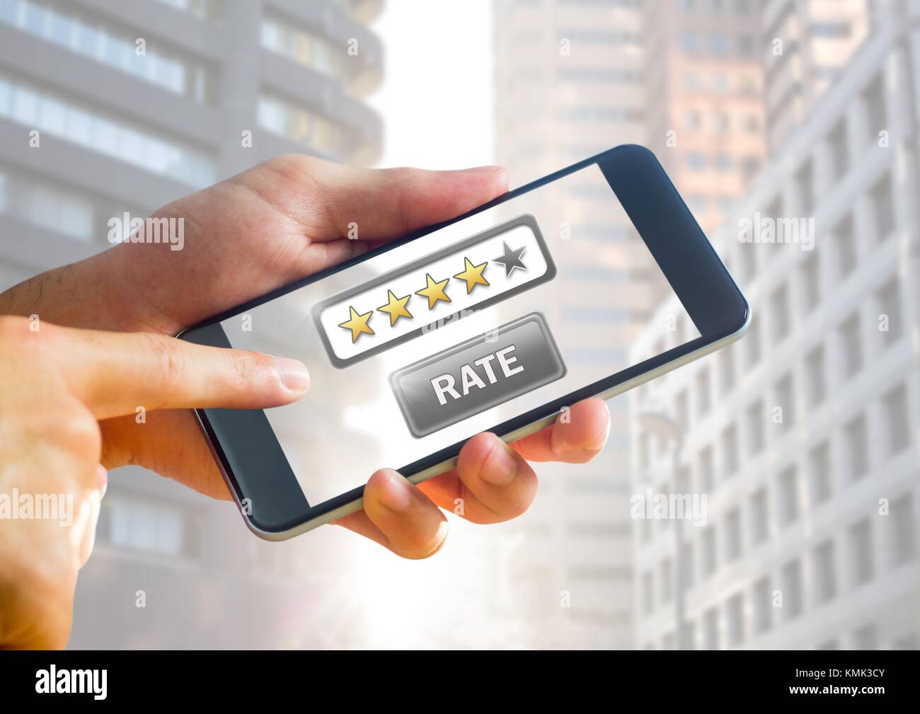 Digital composite of Hand holding phone with rate button and star ...