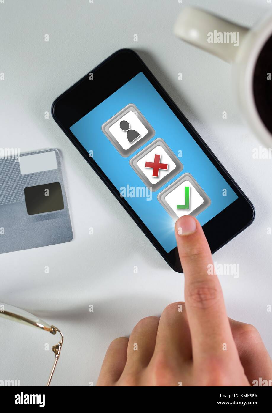 Digital composite of Hand touching phone with user feedback buttons ...