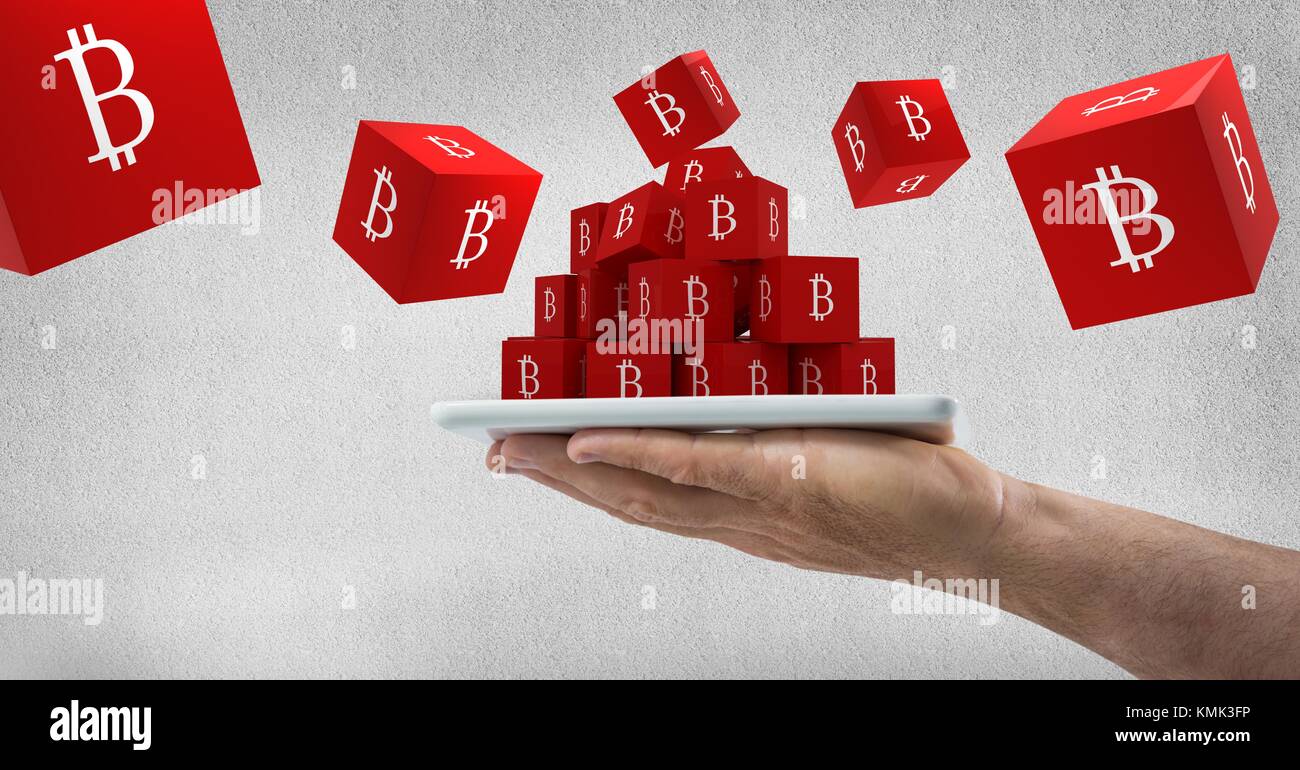 Digital composite of Hand holding tablet with bitcoin symbol icons ...