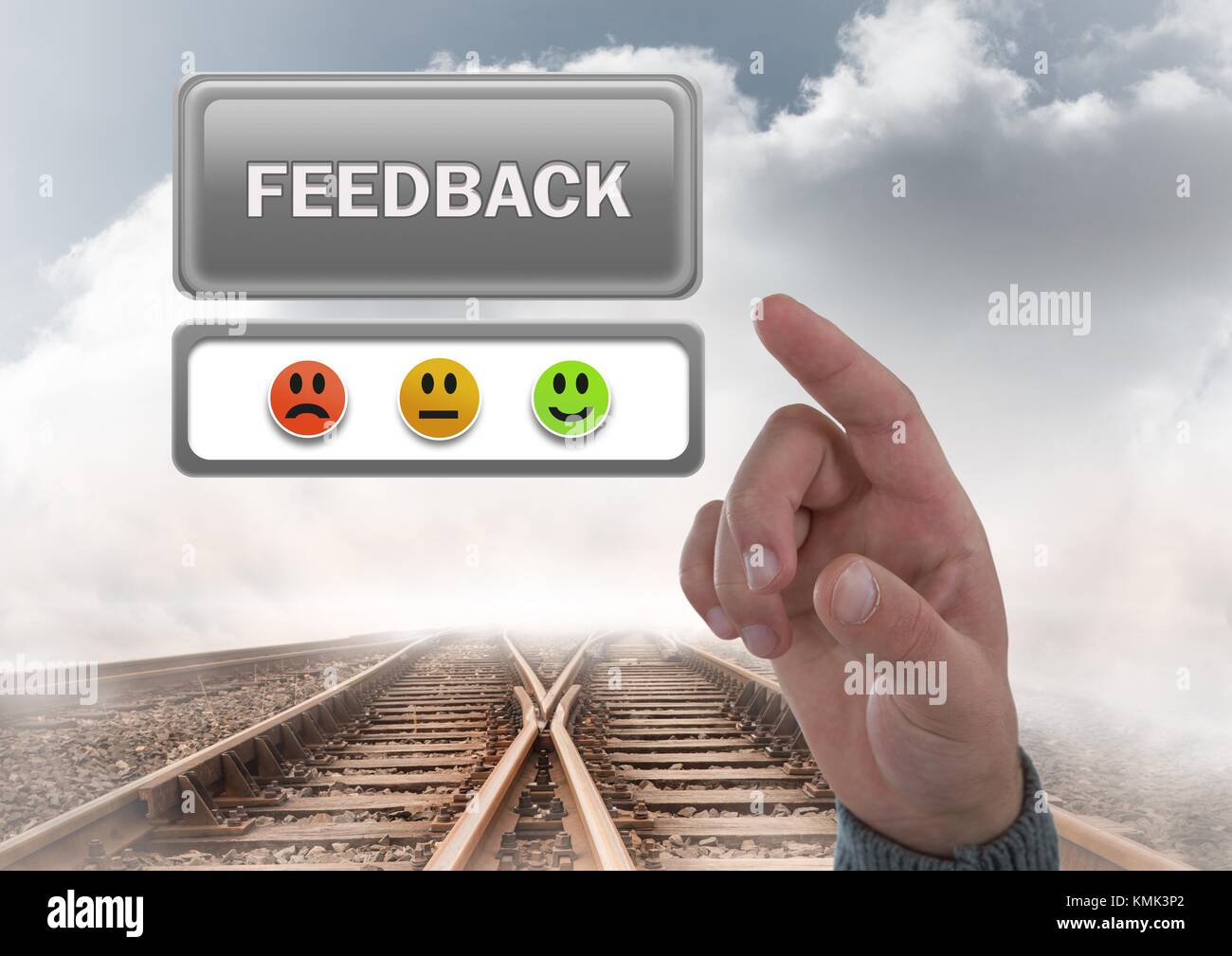Digital composite of Hand pointing at feedback button and smiley faces ...
