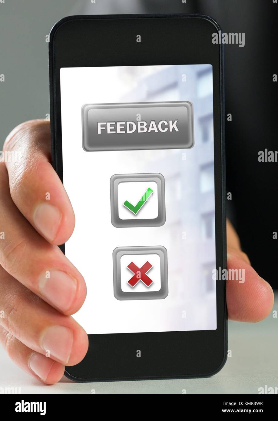 Digital composite of Hand holding phone with feedback buttons Stock ...