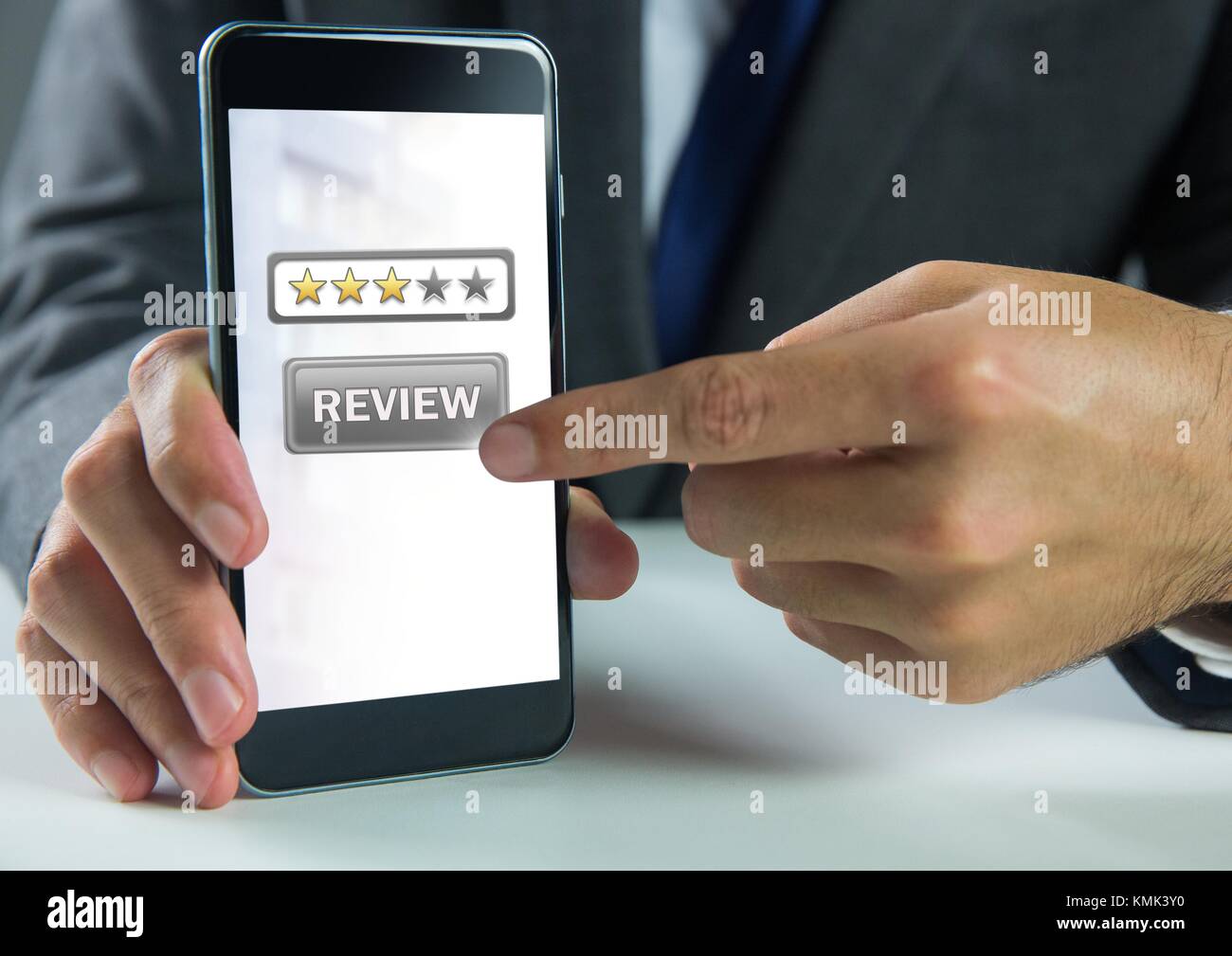 Digital composite of Hand touching review button and star ratings ...