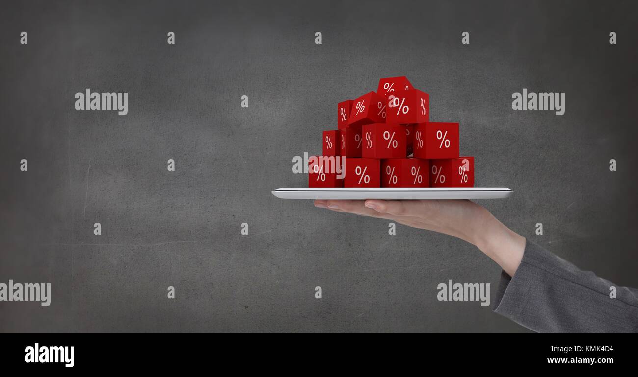 Digital composite of Hand holding tablet with percent symbol icons ...