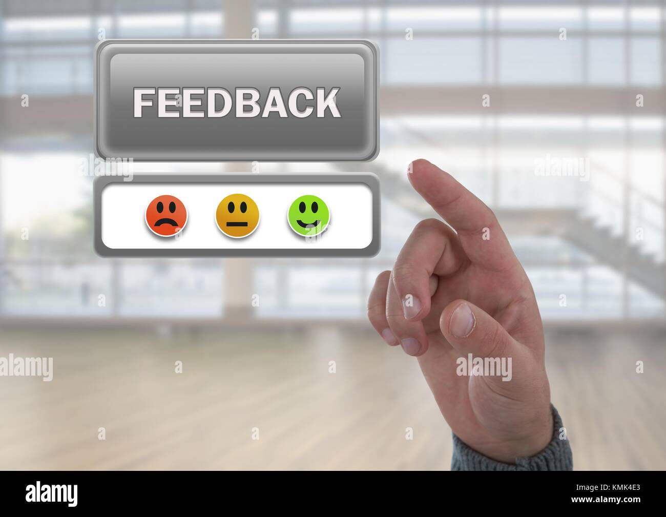 Digital composite of Hand pointing at feedback button and smiley faces ...