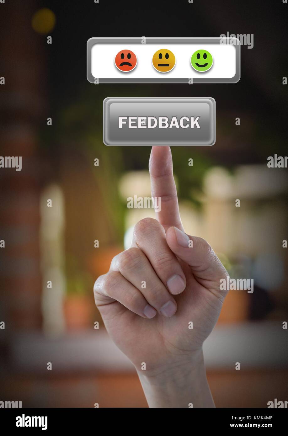 Digital composite of Hand touching feedback button with smiley face ...