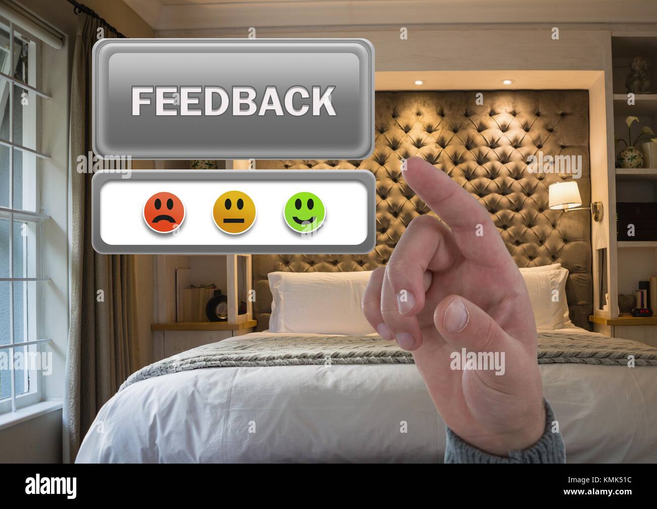 Digital composite of Hand pointing at feedback button and smiley faces ...