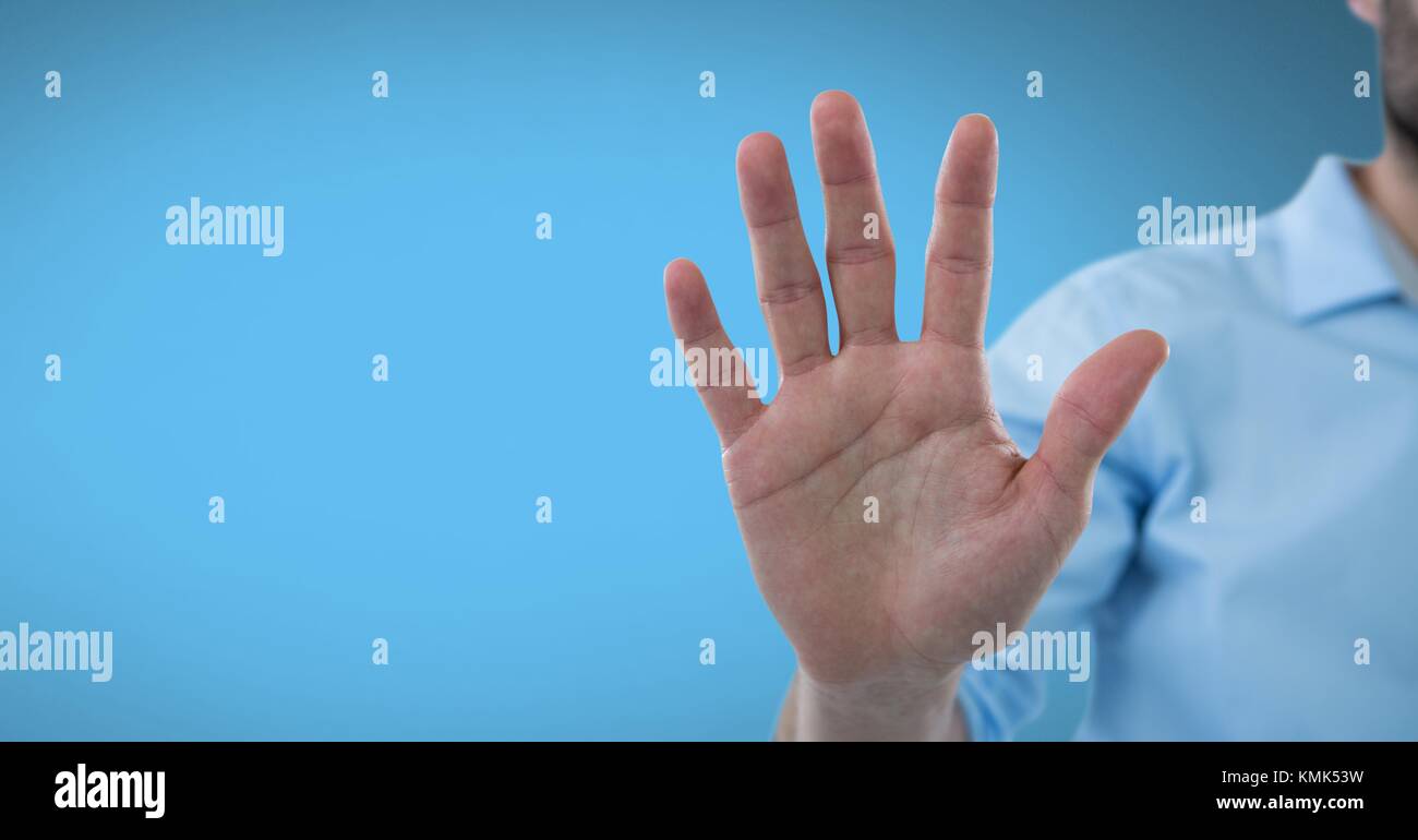 Digital composite of Hand open with bright blue background Stock Photo ...