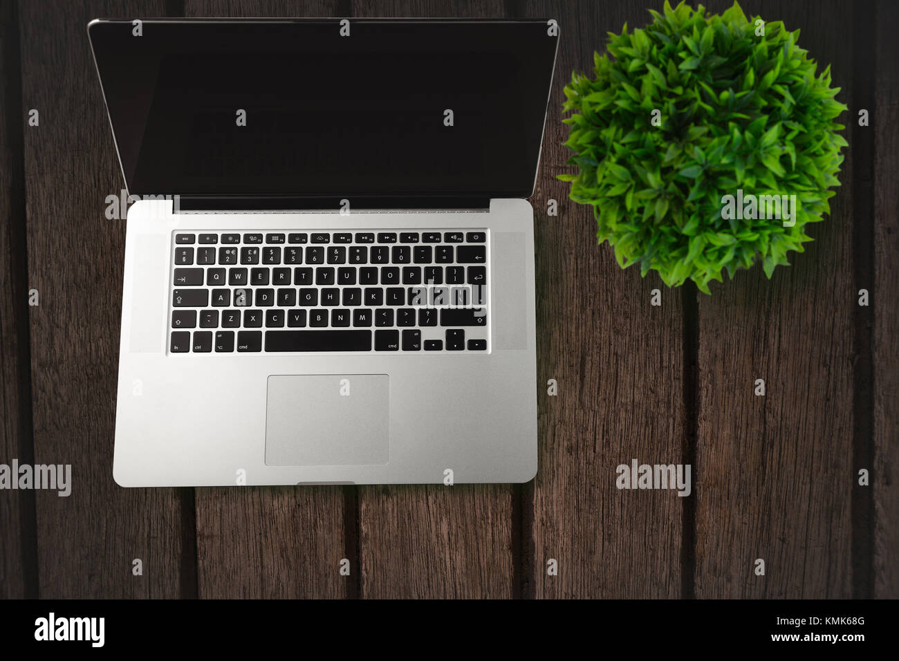 Laptop on table Stock Photo - Alamy