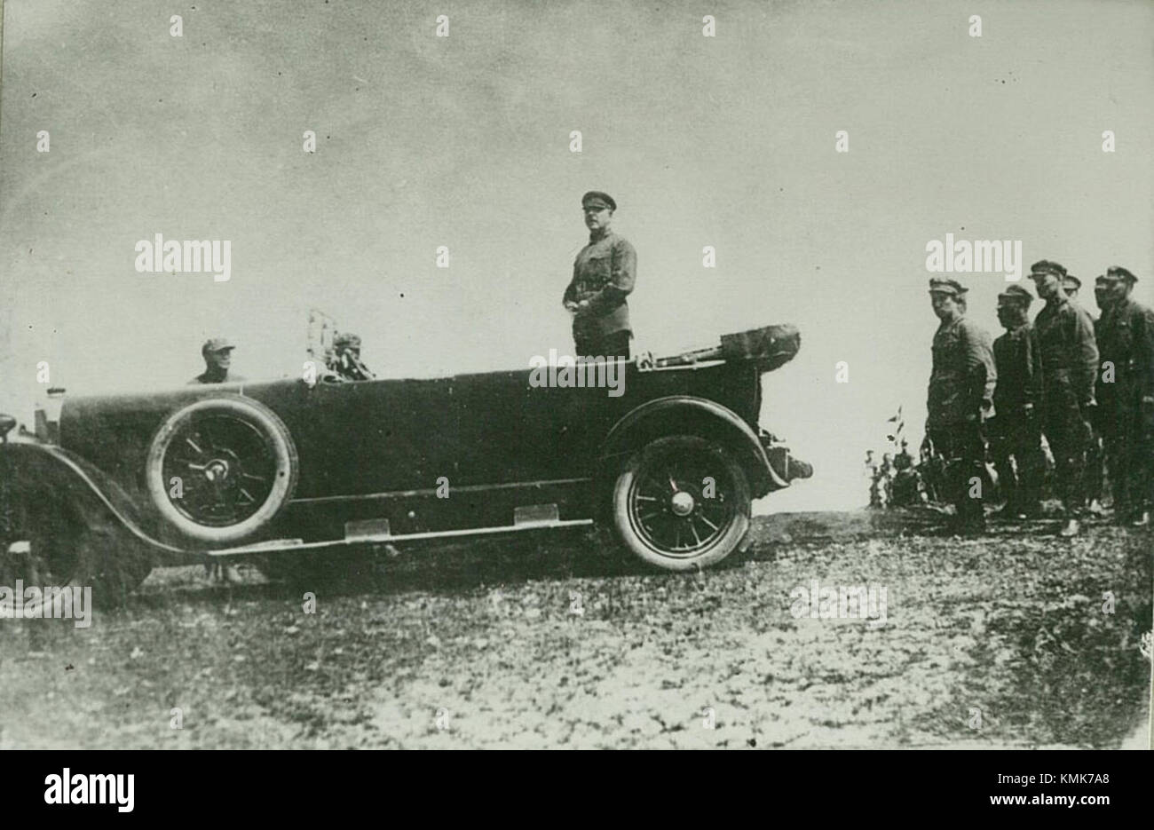This image from 1935 depicts a scene with Kliment Voroshilov, a Soviet ...