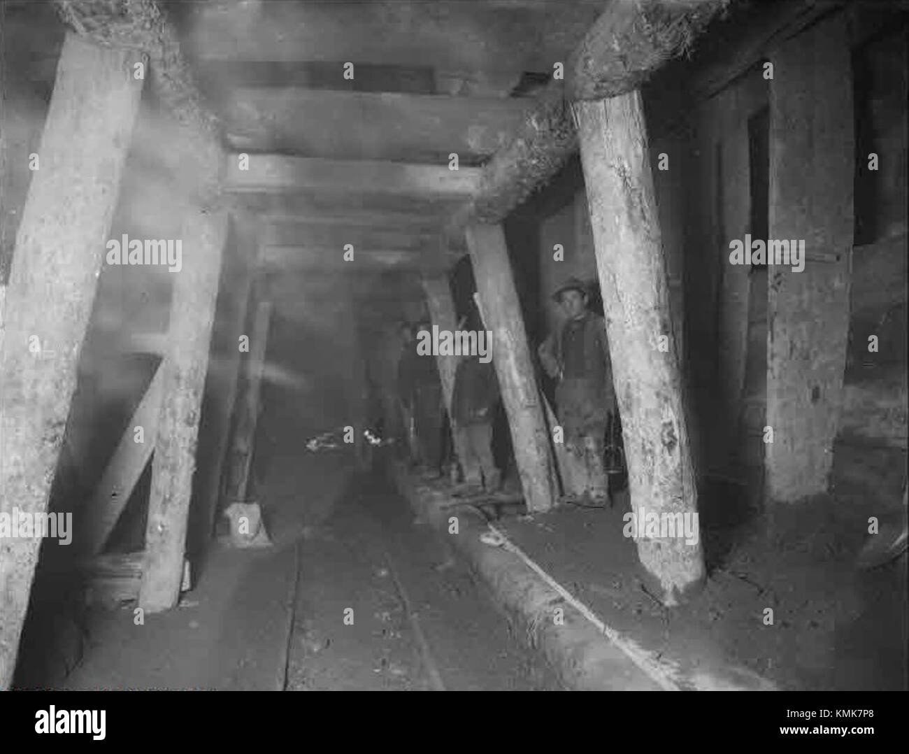 The Bruggwaldtunnel shaft with workers depicts the construction process ...