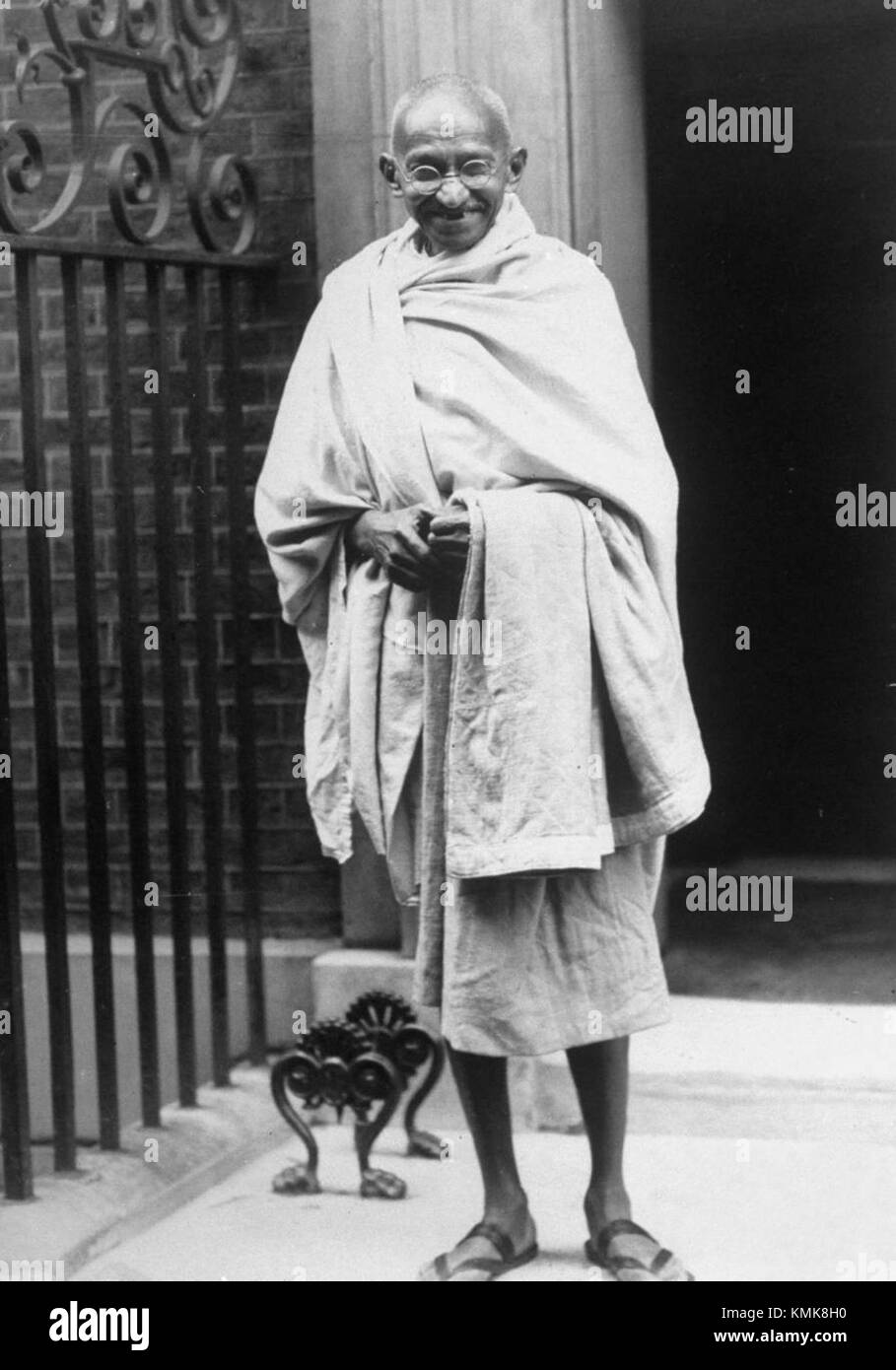 Mahatma Gandhi standing outside 10 Downing Street in London, during his ...