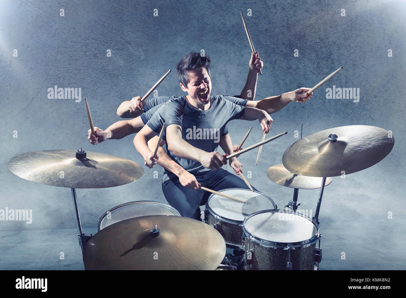 Drummer with multiple arms Stock Photo - Alamy