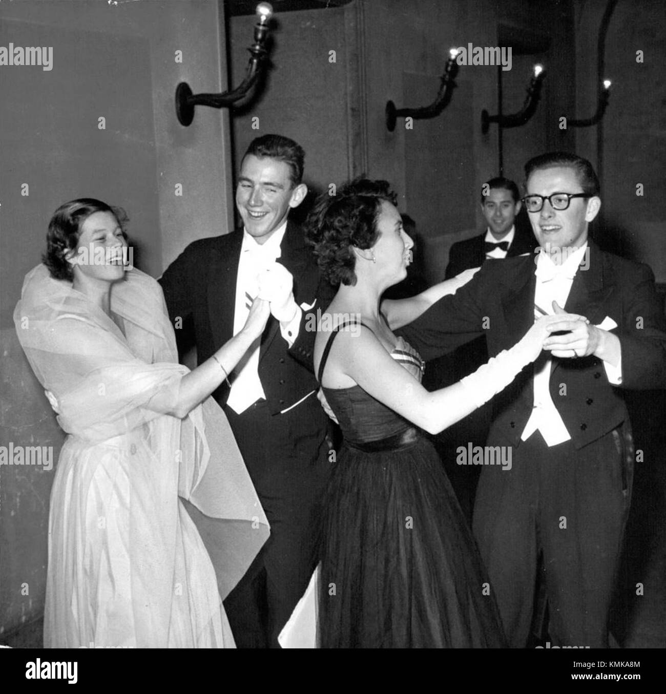A photograph showing students dancing in the Blue Hall, capturing the ...