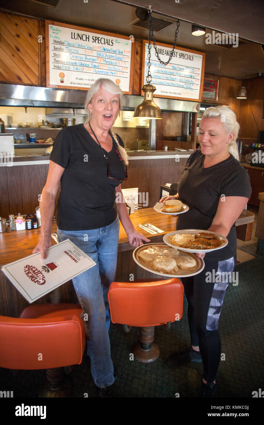 Hostess waitress menu hi-res stock photography and images - Alamy