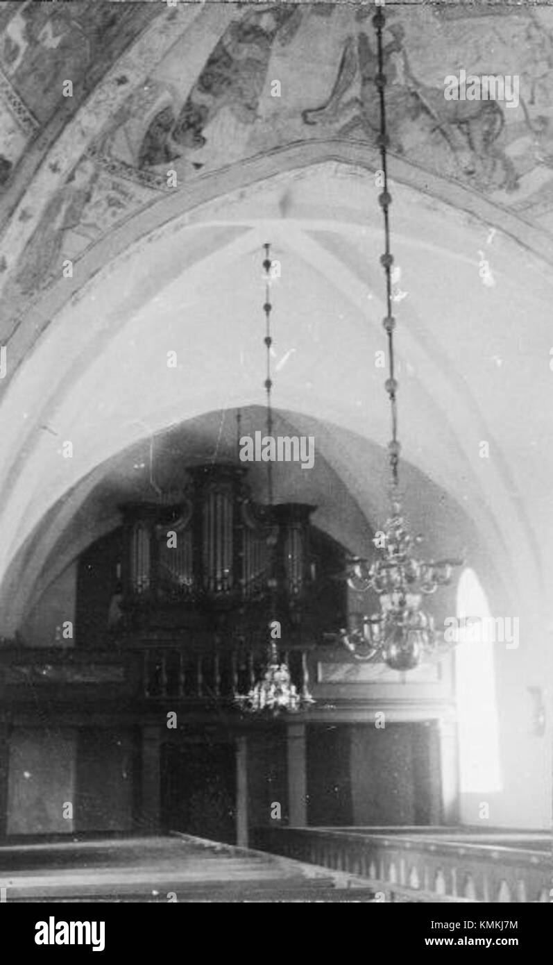 A photograph of Vallby Church in Sweden, showcasing its traditional ...