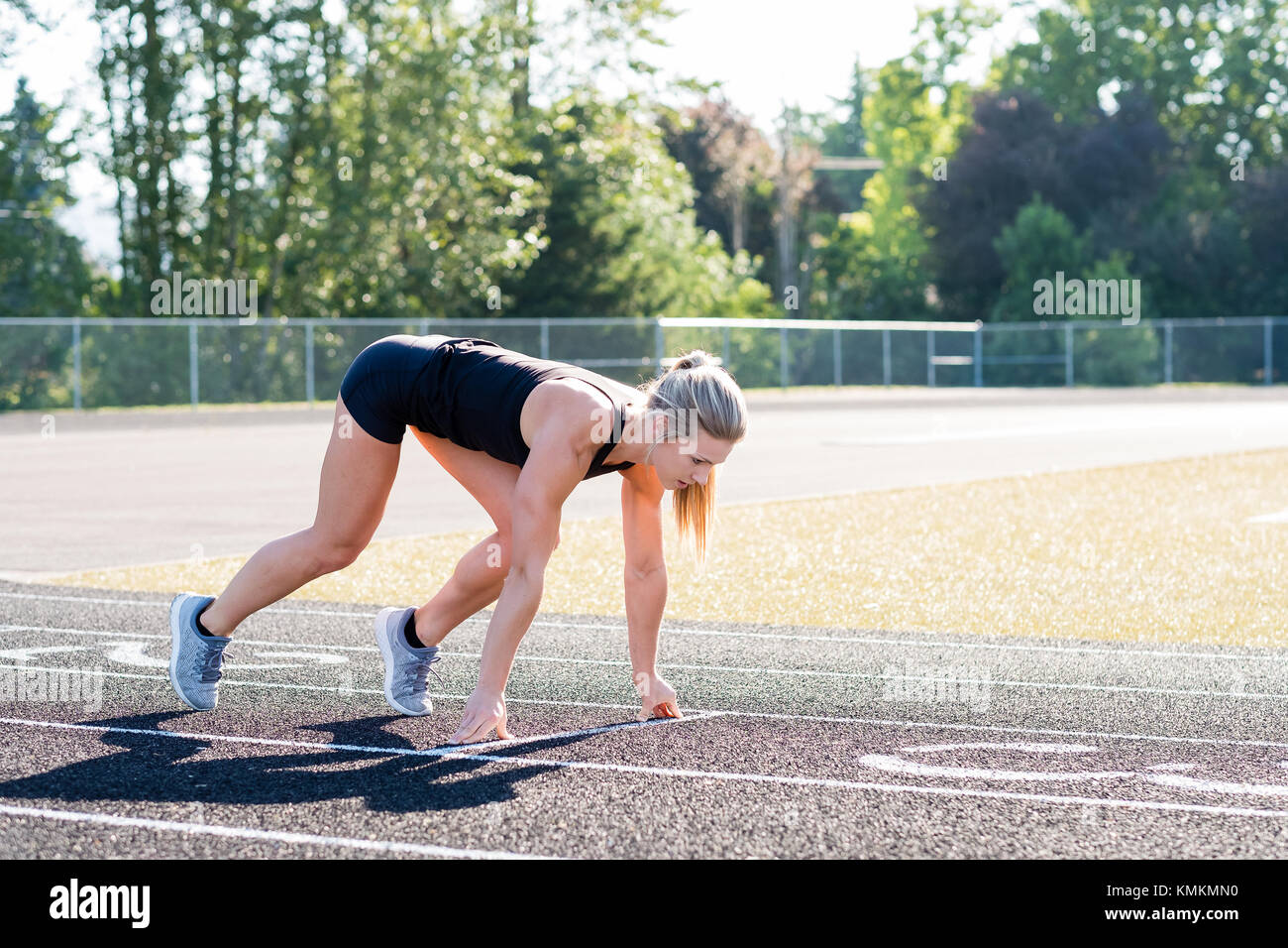 Young Female Athlete Working Out on Track Stock Photo - Alamy