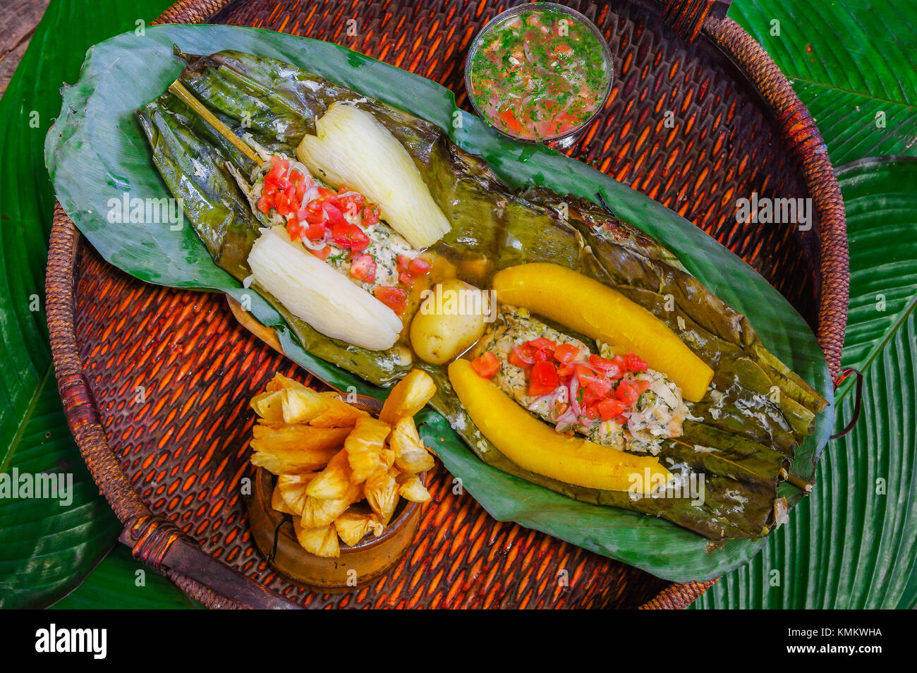 Above view of delicious typical amazonian food, fish cooked in a leaf ...