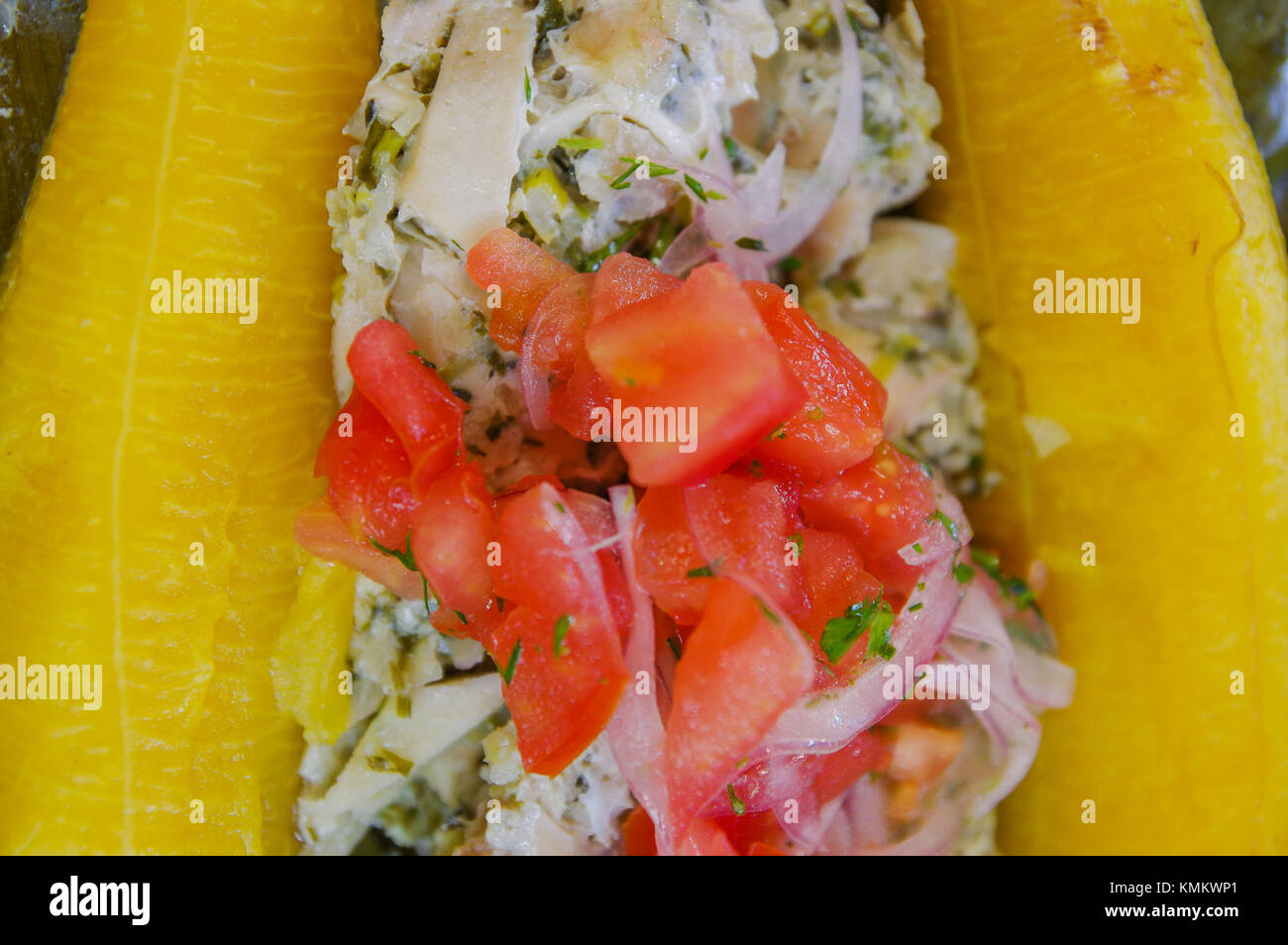 Close up of delicious typical amazonia food, fish cooked in a leaf with ...