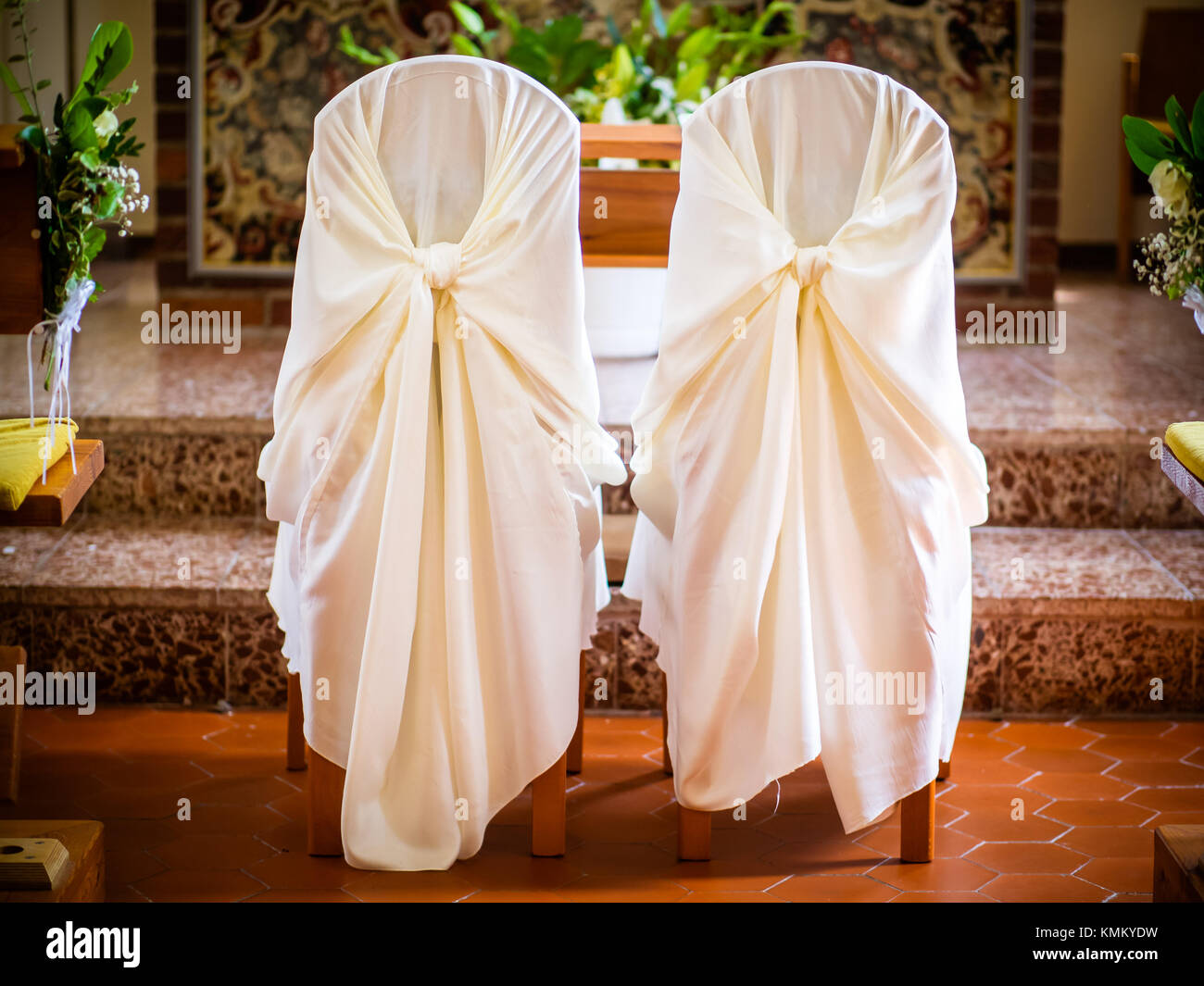 the waiting chairs in front of the altar are waiting for the bride and ...