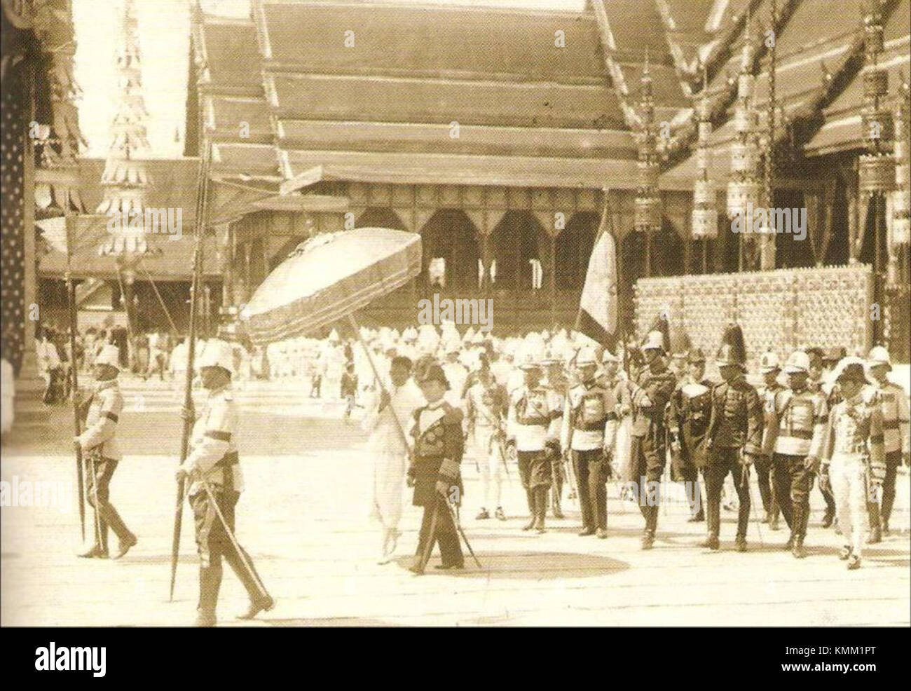 King Vajiravudh of Thailand is depicted moving around the Pra Meru Mas ...