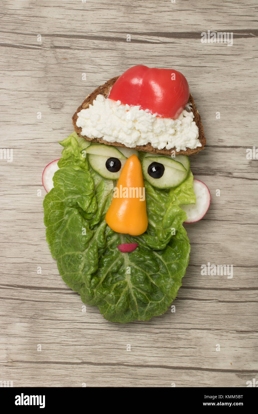 Santa Claus made with salad, bread and cheese Stock Photo - Alamy