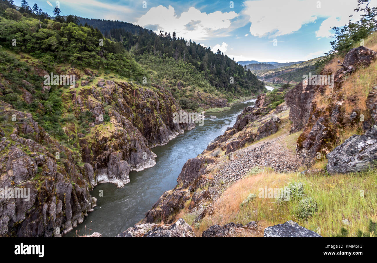 The Rogue River flows through a rocky canyon as seen from the Hellgate ...