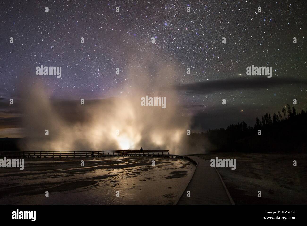 Car headlights illuminate the steam plume erupting from the Excelsior ...
