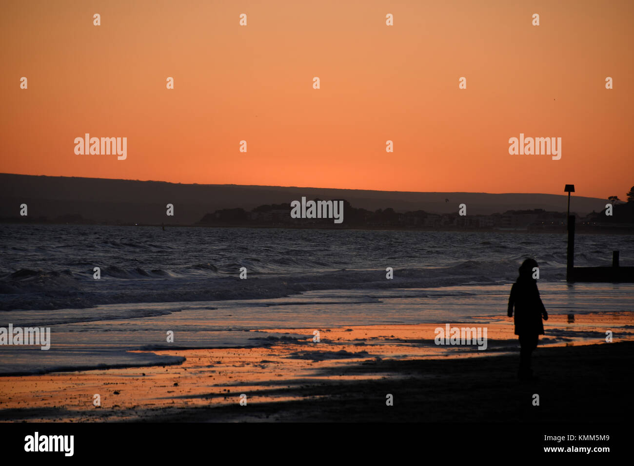 Person on the beach hi-res stock photography and images - Alamy