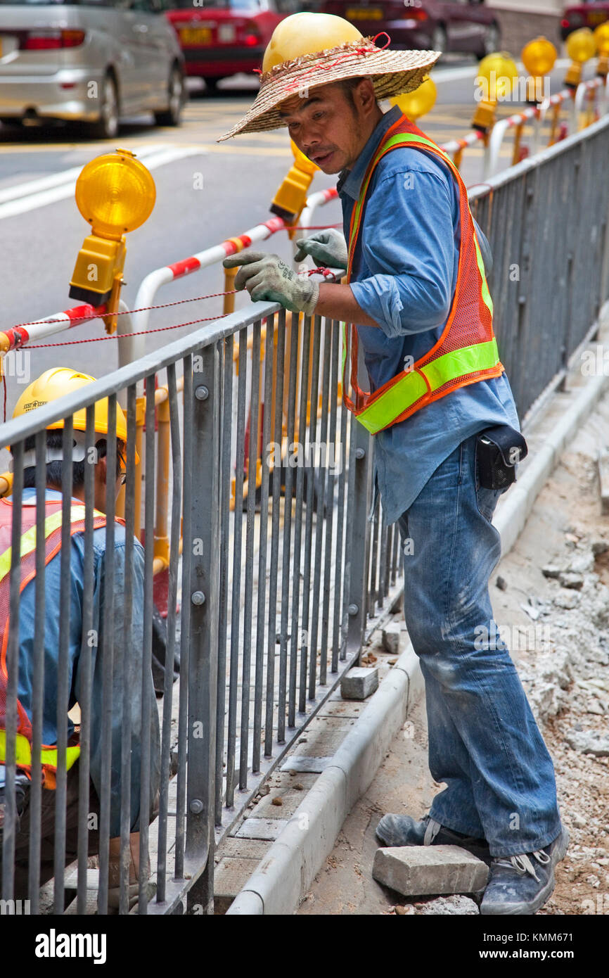 Construction workers, Hong Kong island, SAR, China Stock Photo - Alamy