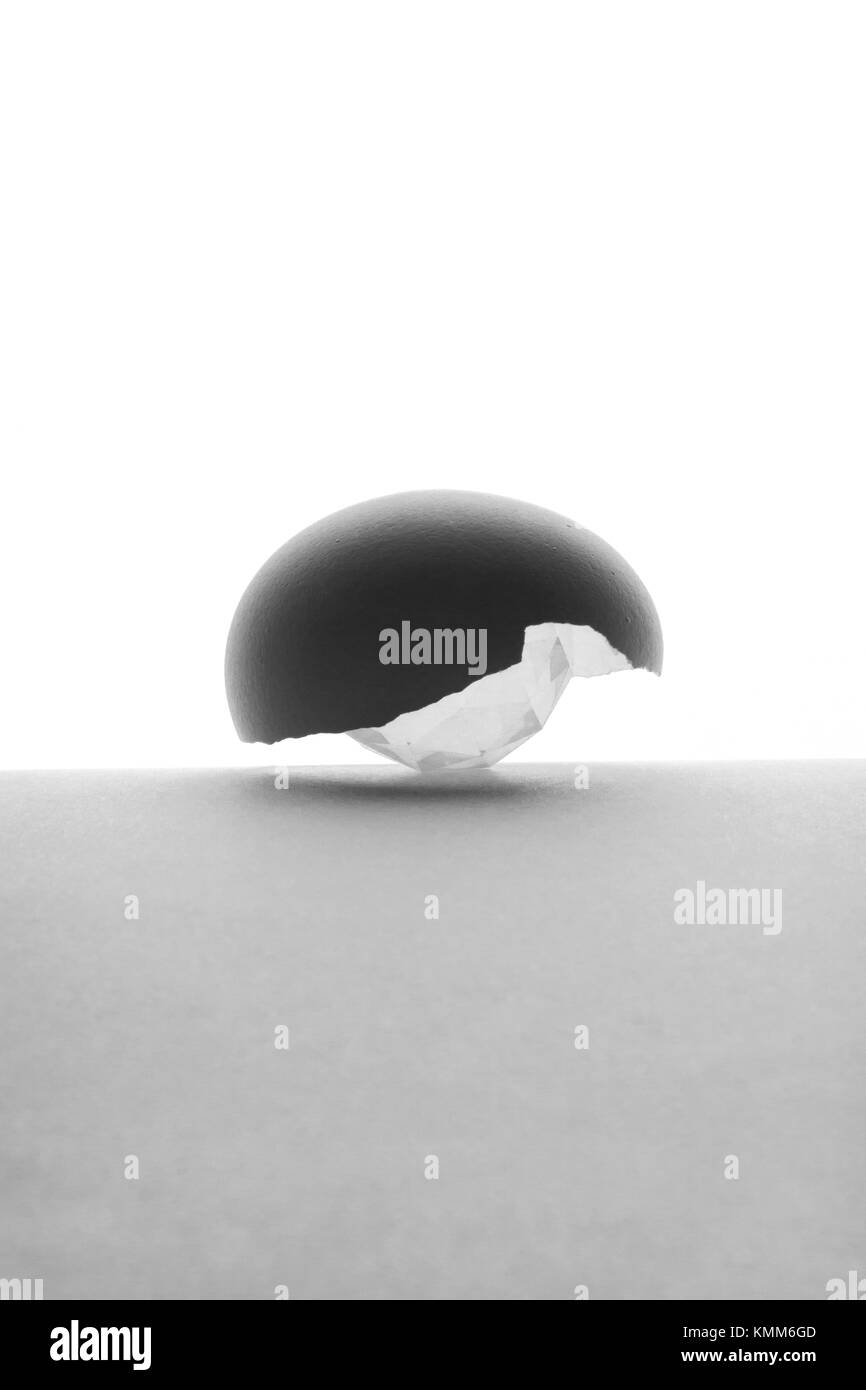 crystal under the shell of eggs on white background. Idea concept Stock ...