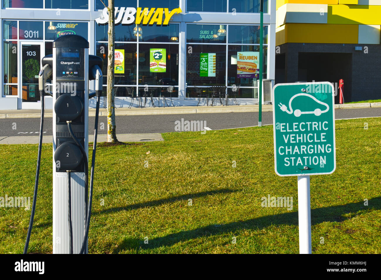 Electric car charging station outside a Subway fast food restaurant in ...
