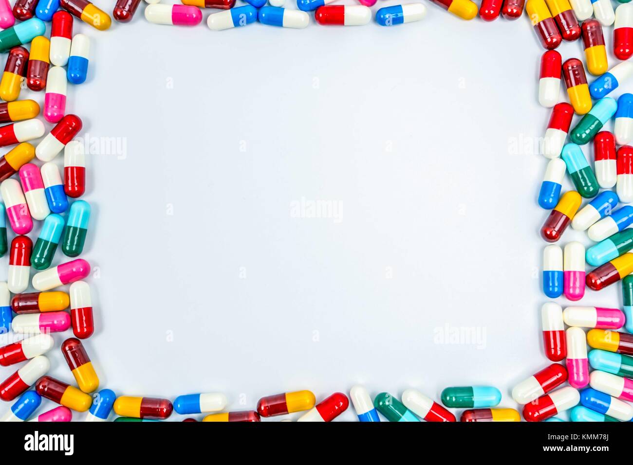 Colorful of antibiotics capsule pills rectangle frame on white ...