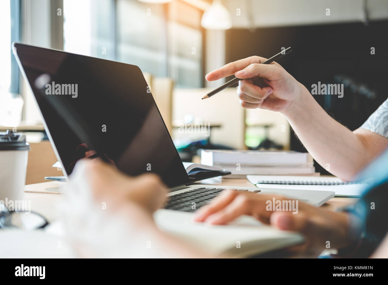 University students using laptop for research homework in college Stock ...