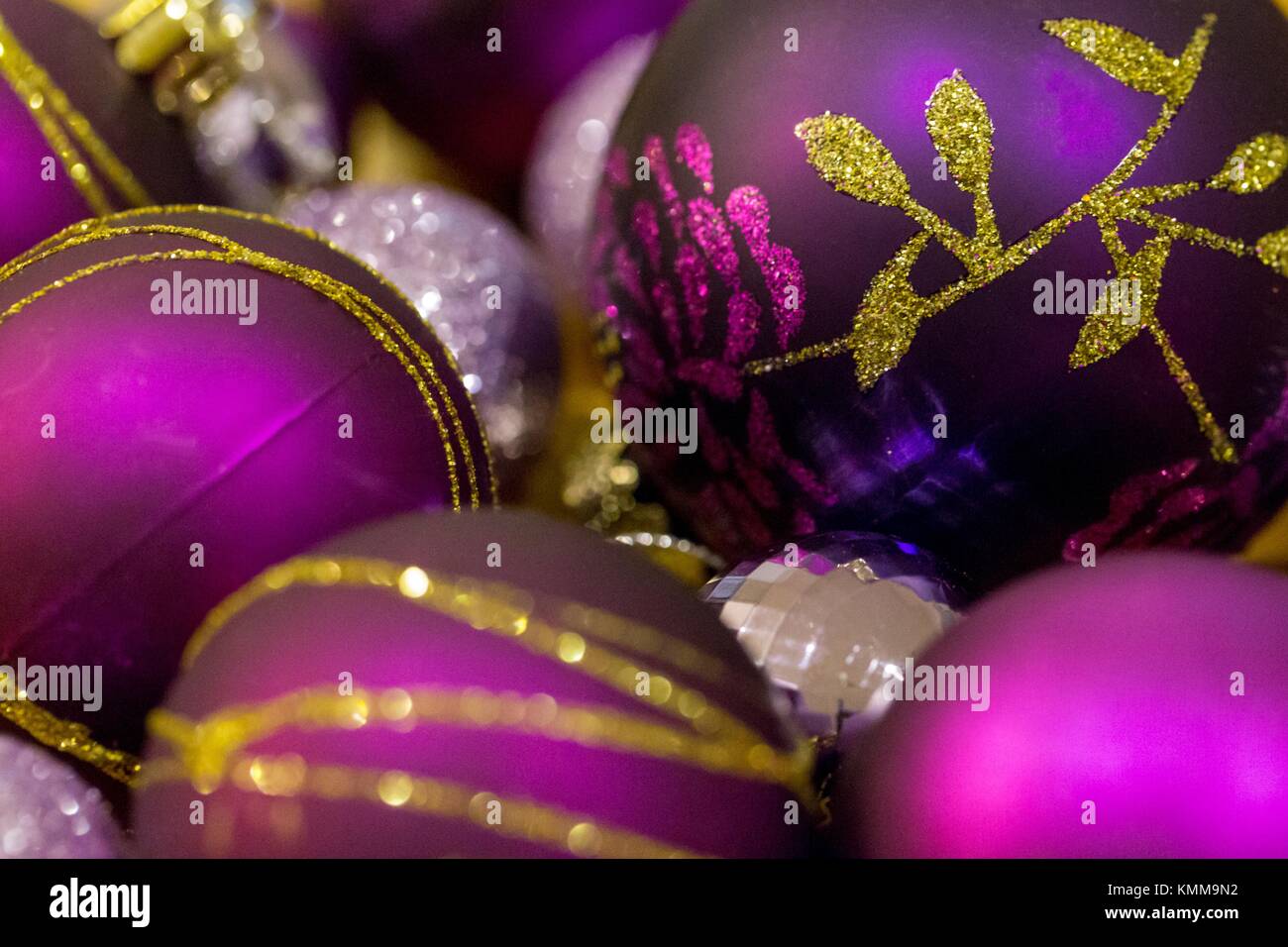 Purple and silver Christmas baubles Stock Photo - Alamy