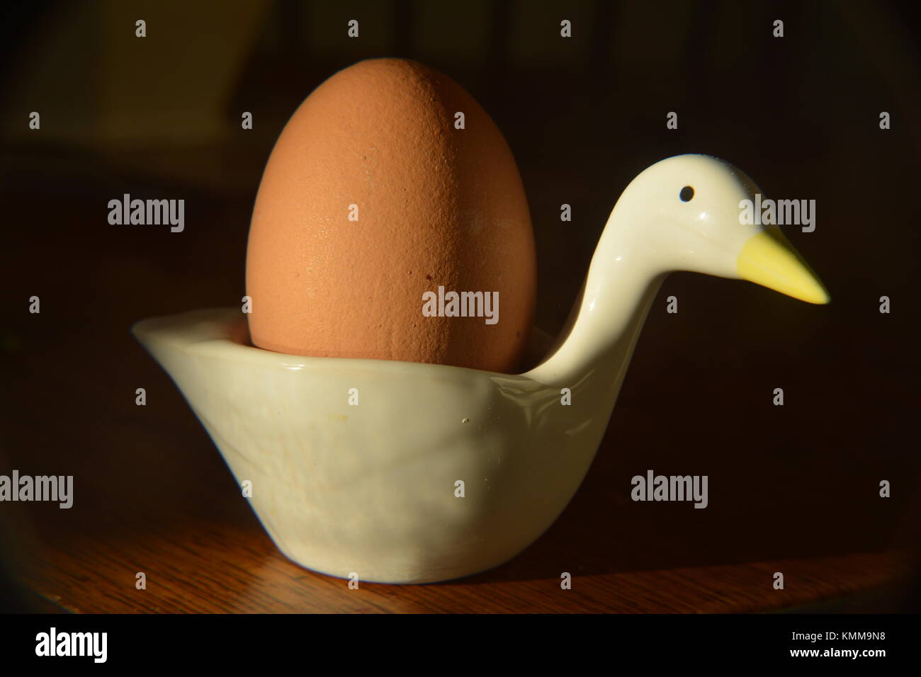 Goose egg cup with boiled egg Stock Photo - Alamy
