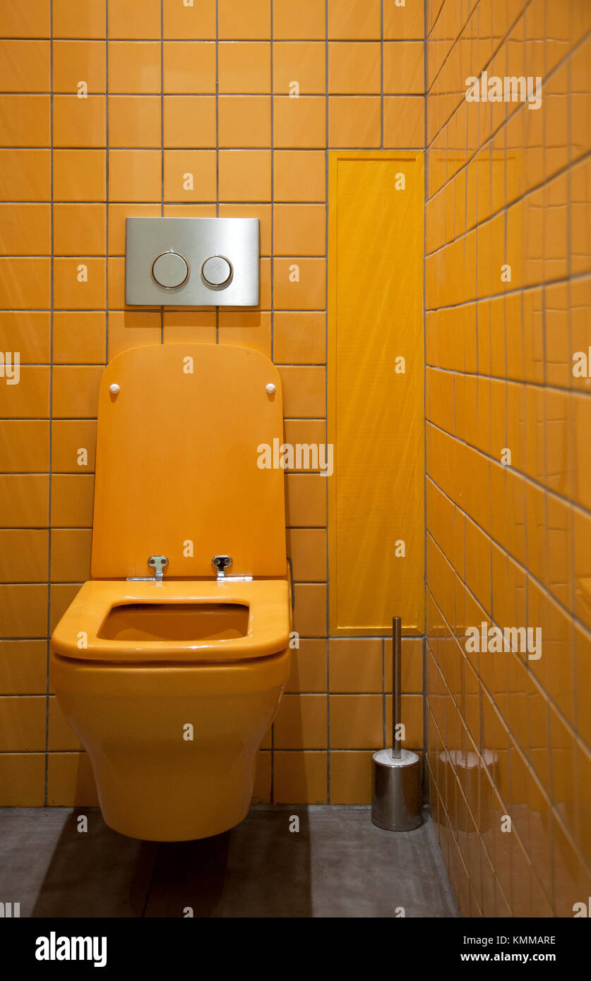 Brightly Tiled Restroom Toilet Stock Photo - Alamy