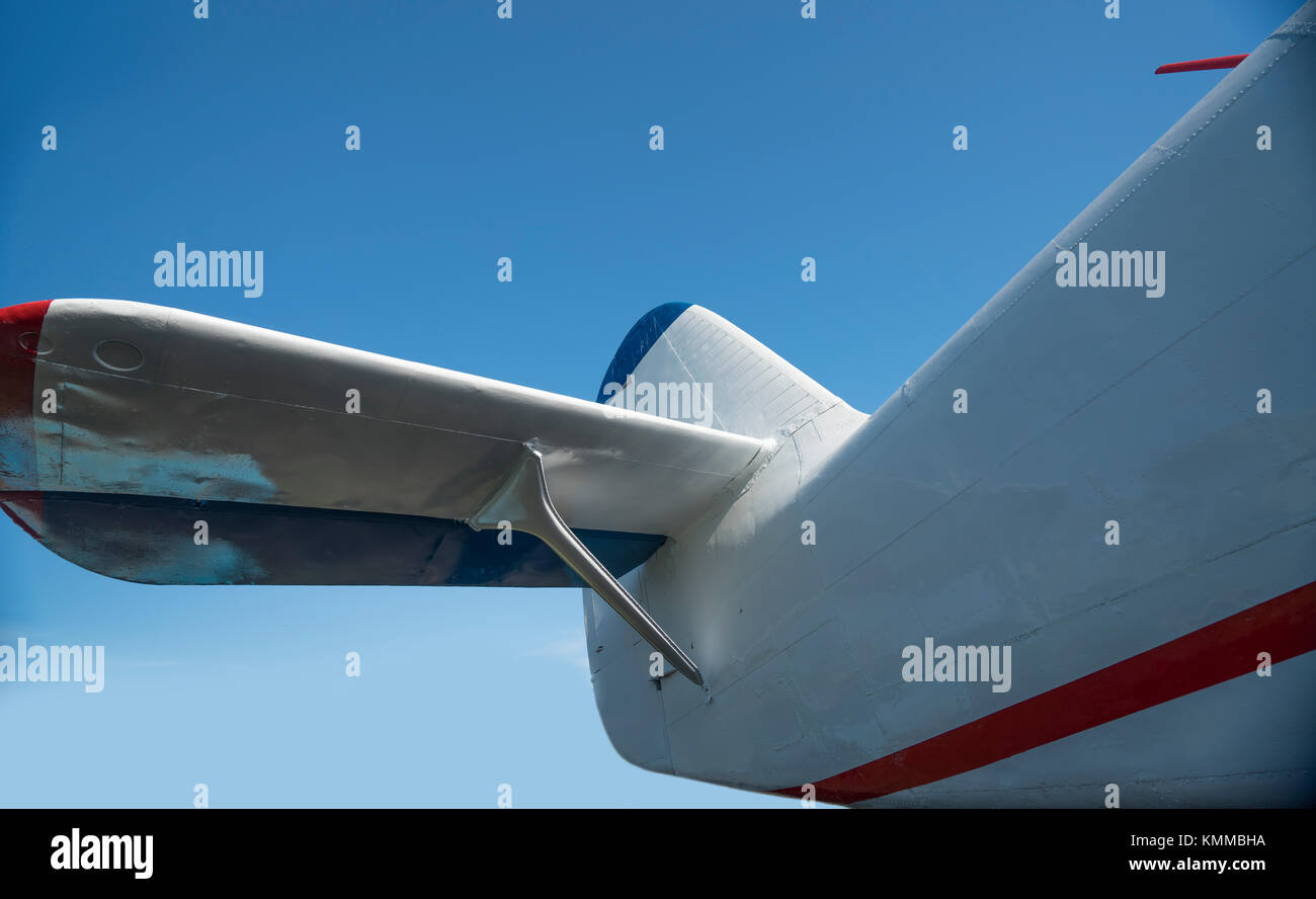 airplane tail close-up view with blue sky Stock Photo - Alamy
