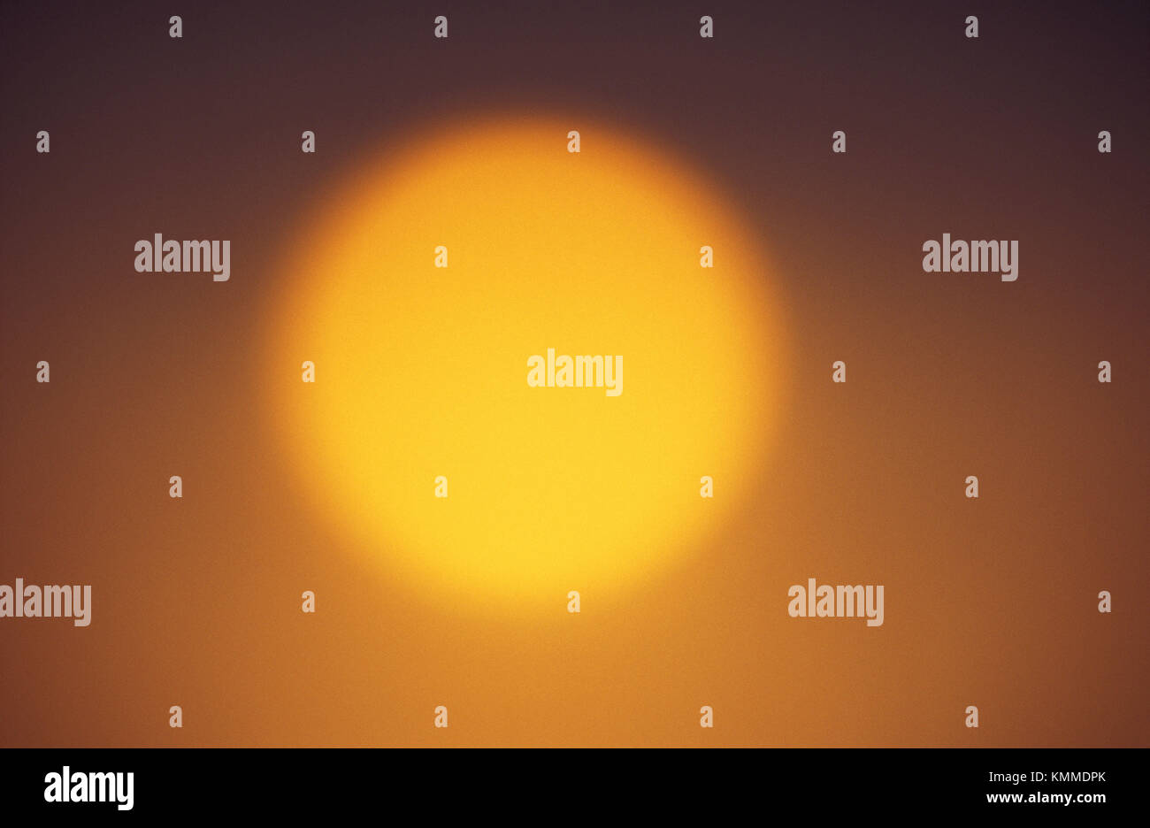 Out of focus yellow orange sun Stock Photo - Alamy