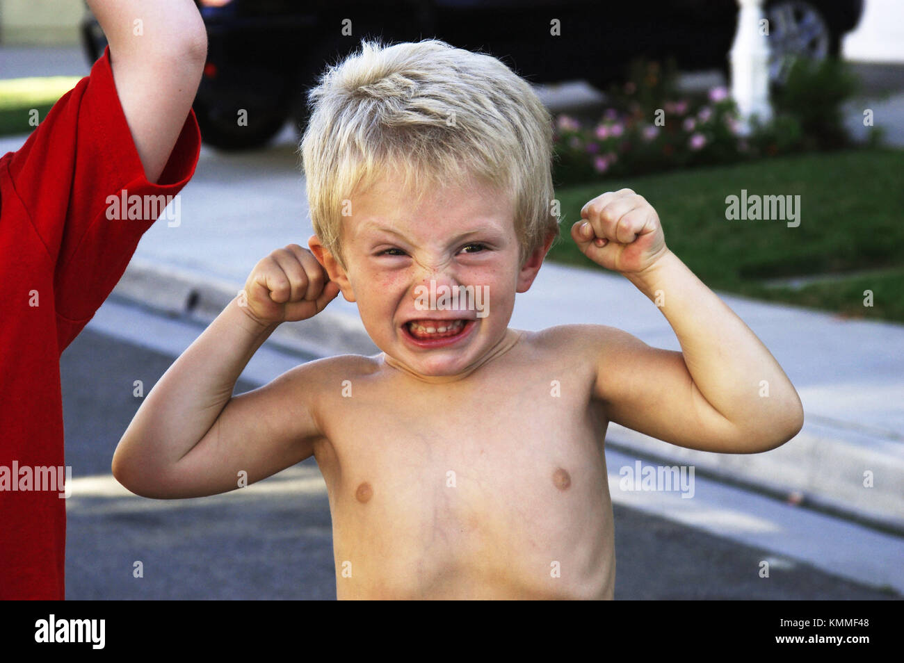 Boy making muscles hi-res stock photography and images - Alamy