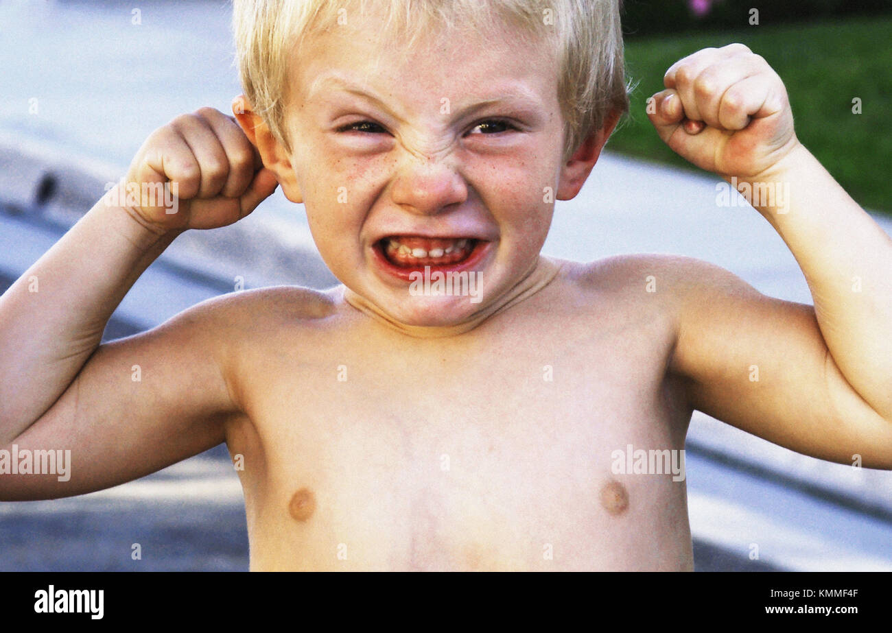 Boy making muscles hi-res stock photography and images - Alamy