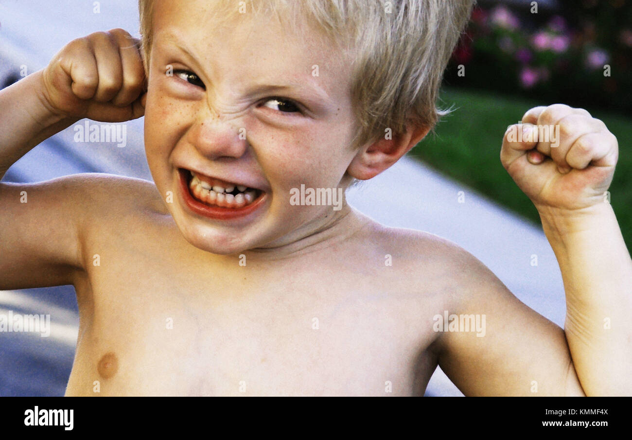 Boy making muscles hi-res stock photography and images - Alamy