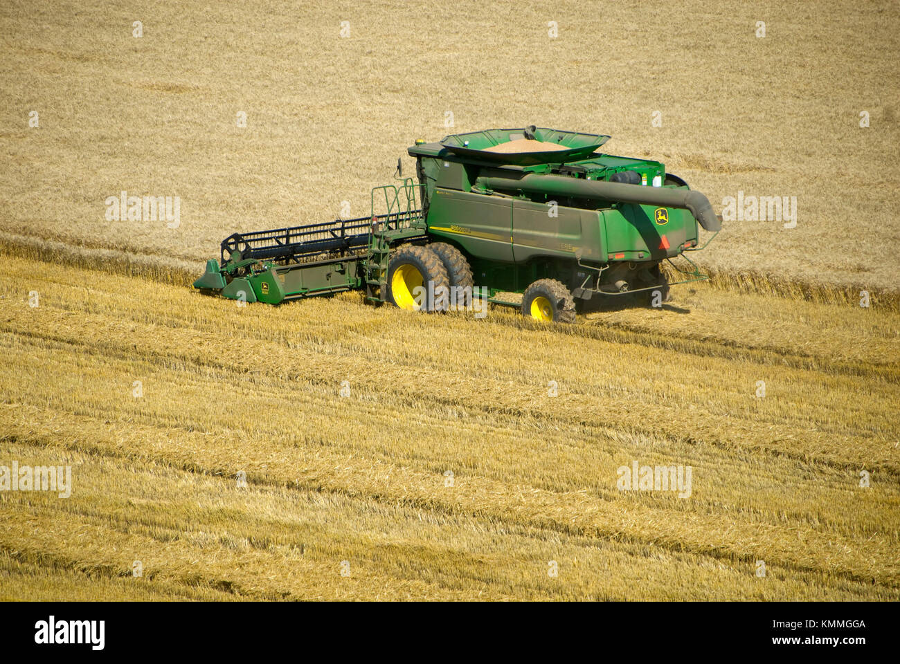 THREE JOHN DEERE COMBINES HARVESTING 95 - 100 BU. WHEAT IN TEXAS ...